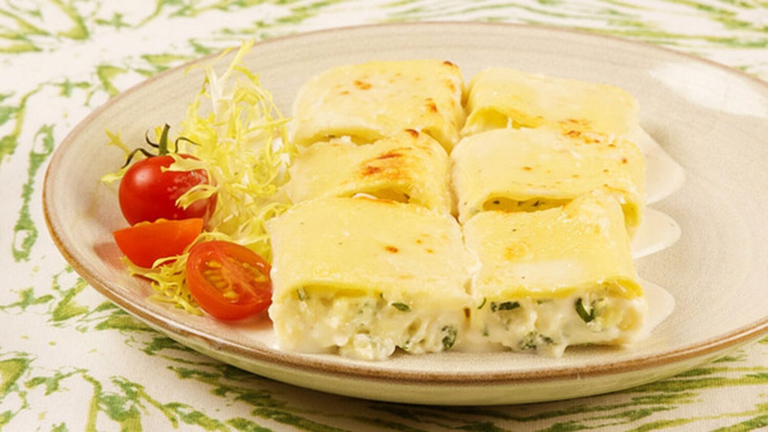 Three-Cheese Rotollo with White Sauce | Canadian Living