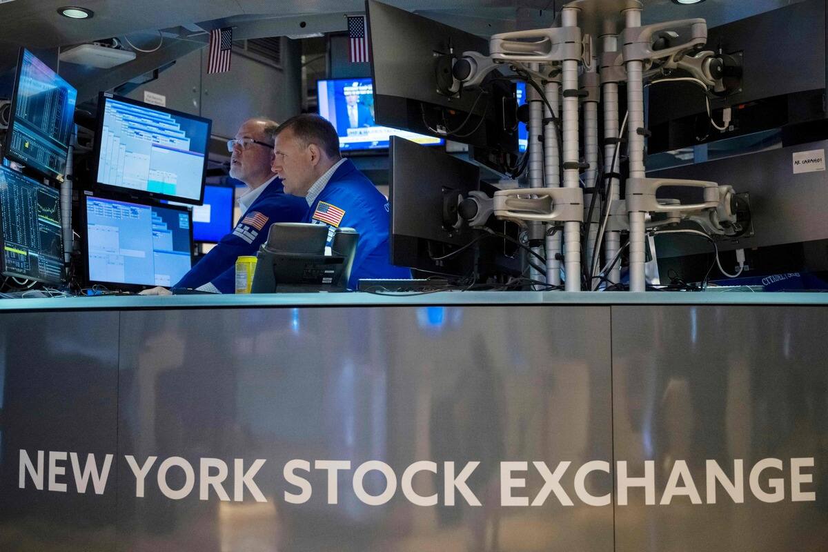 Wall Street termine en ordre dispersé, record pour le Dow Jones | JDM