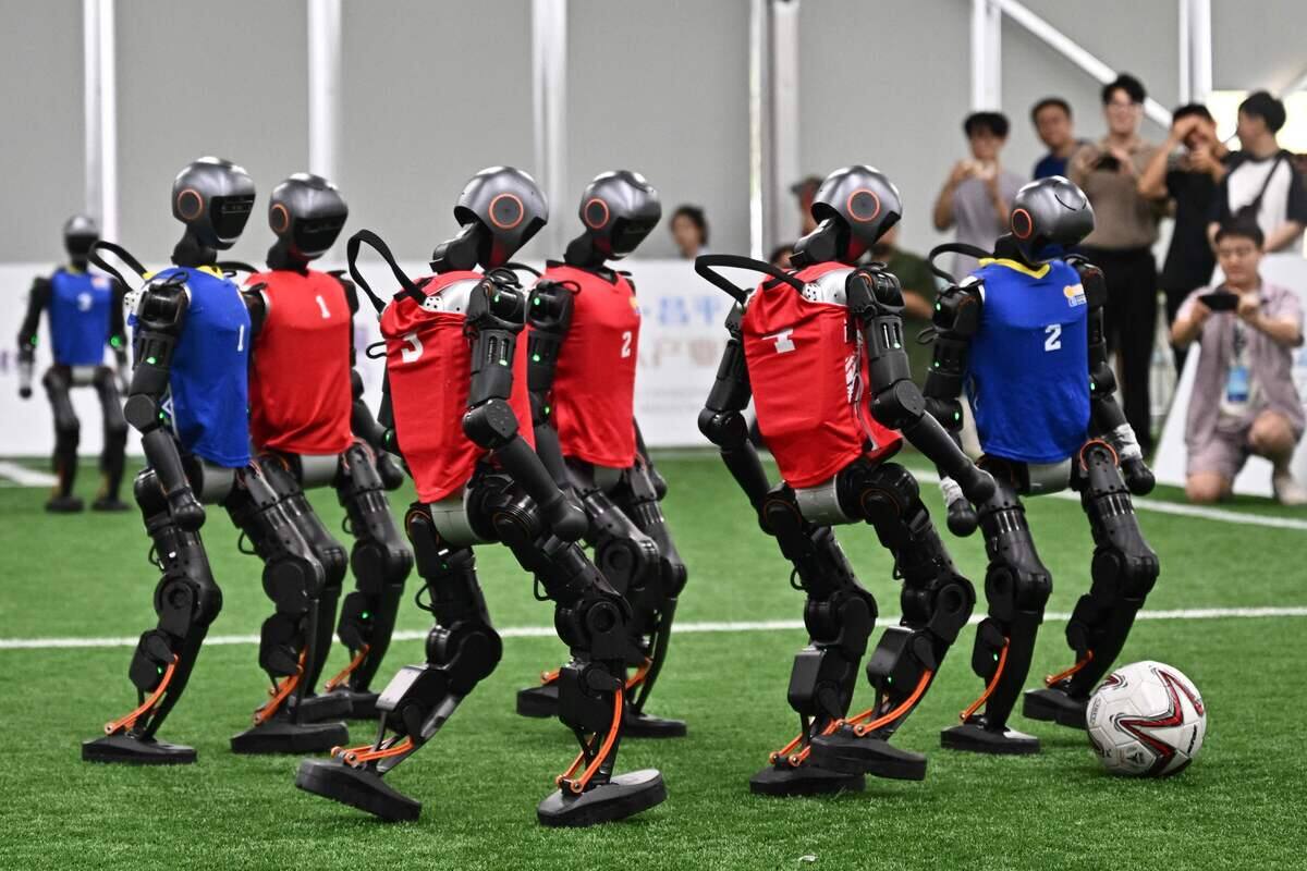 EN IMAGES | La première compétition mondiale de robots humanoïdes ...