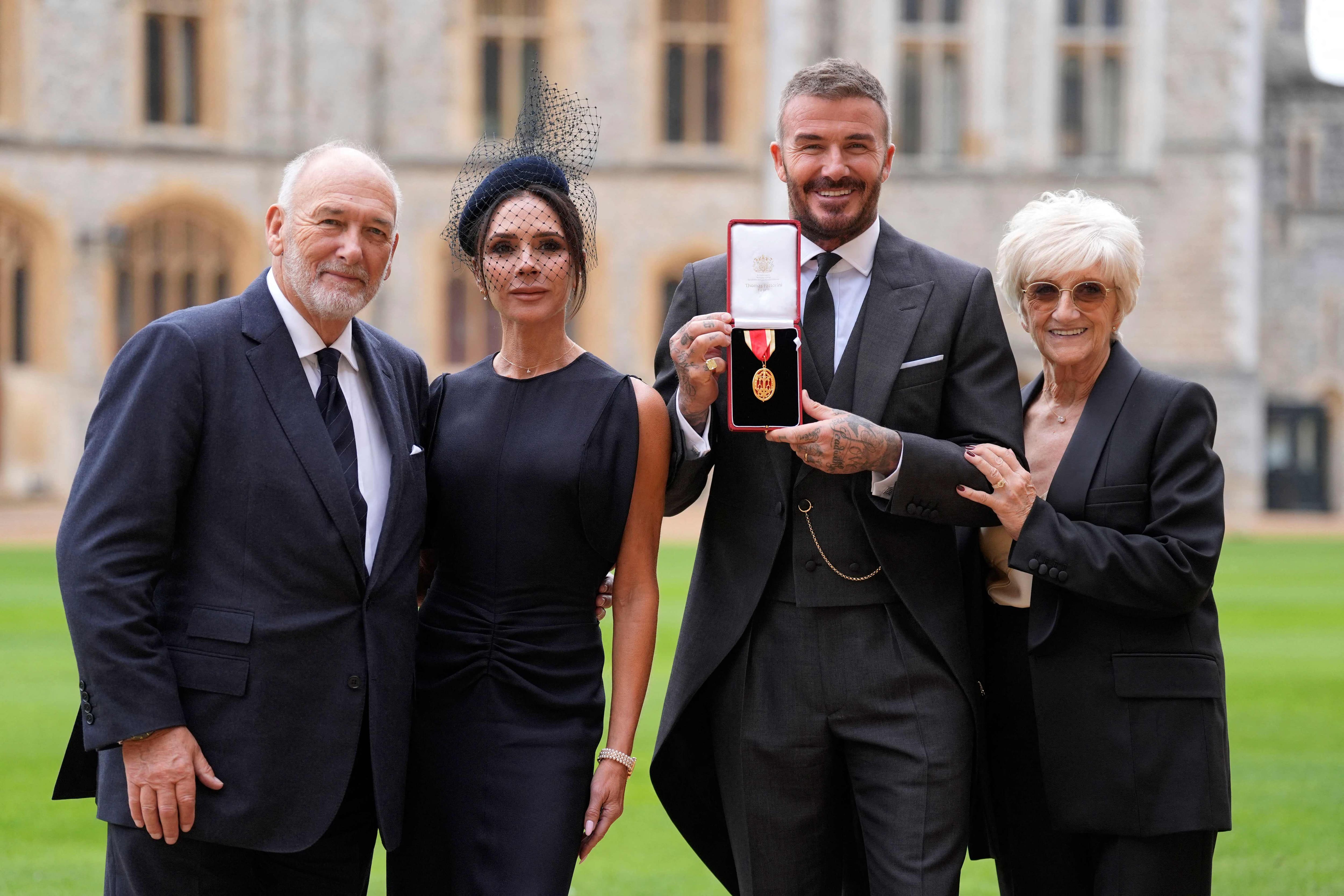 David Beckham décoré par Charles III lors d’une cérémonie au château de ...