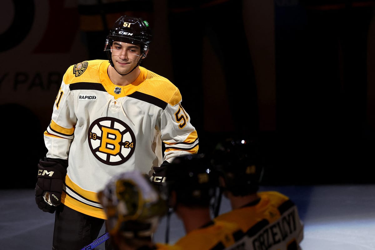 Matthew Poitras se fait ramasser (amicalement) par son père - TVA Sports