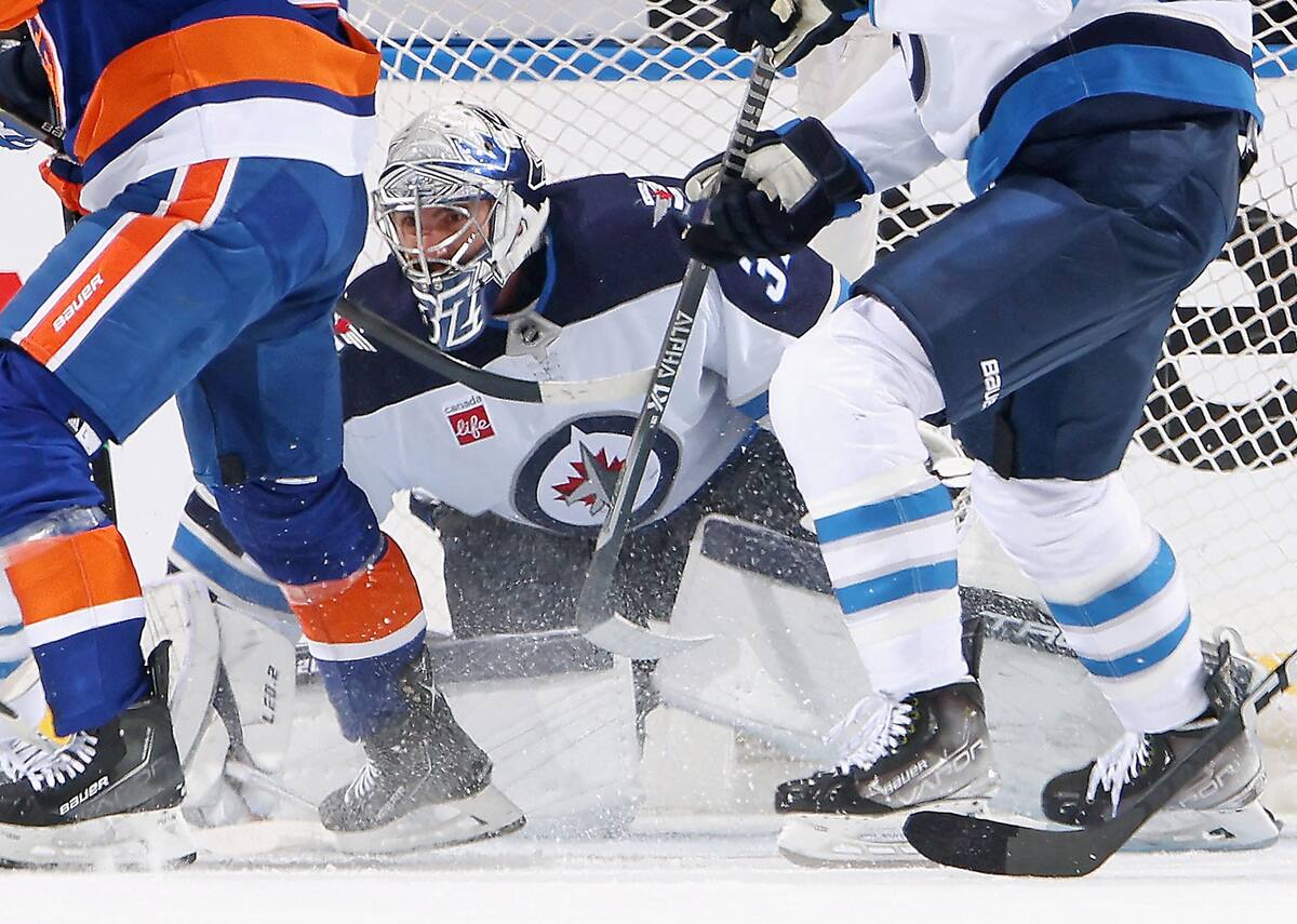 L’échange de Pierre-Luc Dubois a convaincu Connor Hellebuyck de rester ...