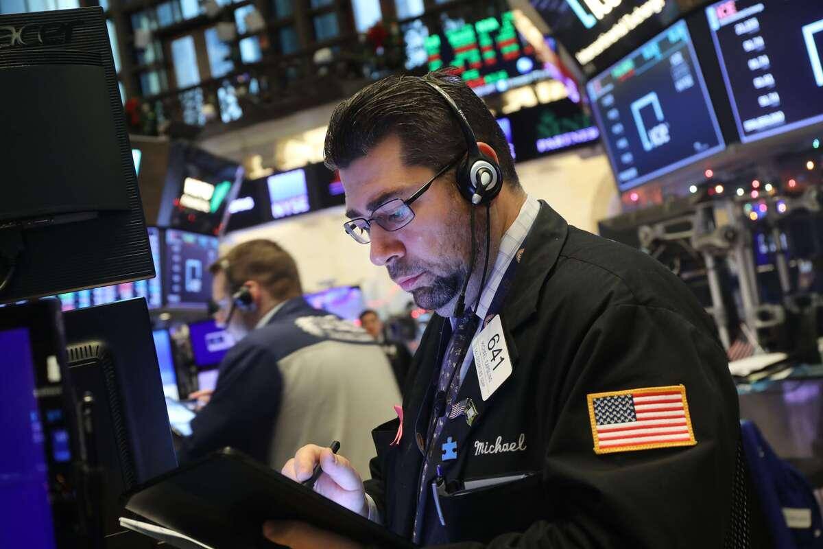 À Wall Street, Nasdaq et S&P 500 enregistrent leur meilleure année en ...
