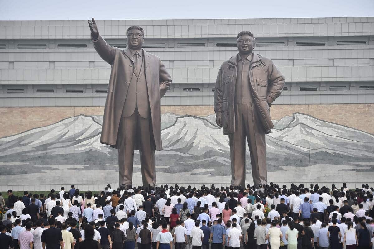 North Koreans urge protection of Kim's statues during storm