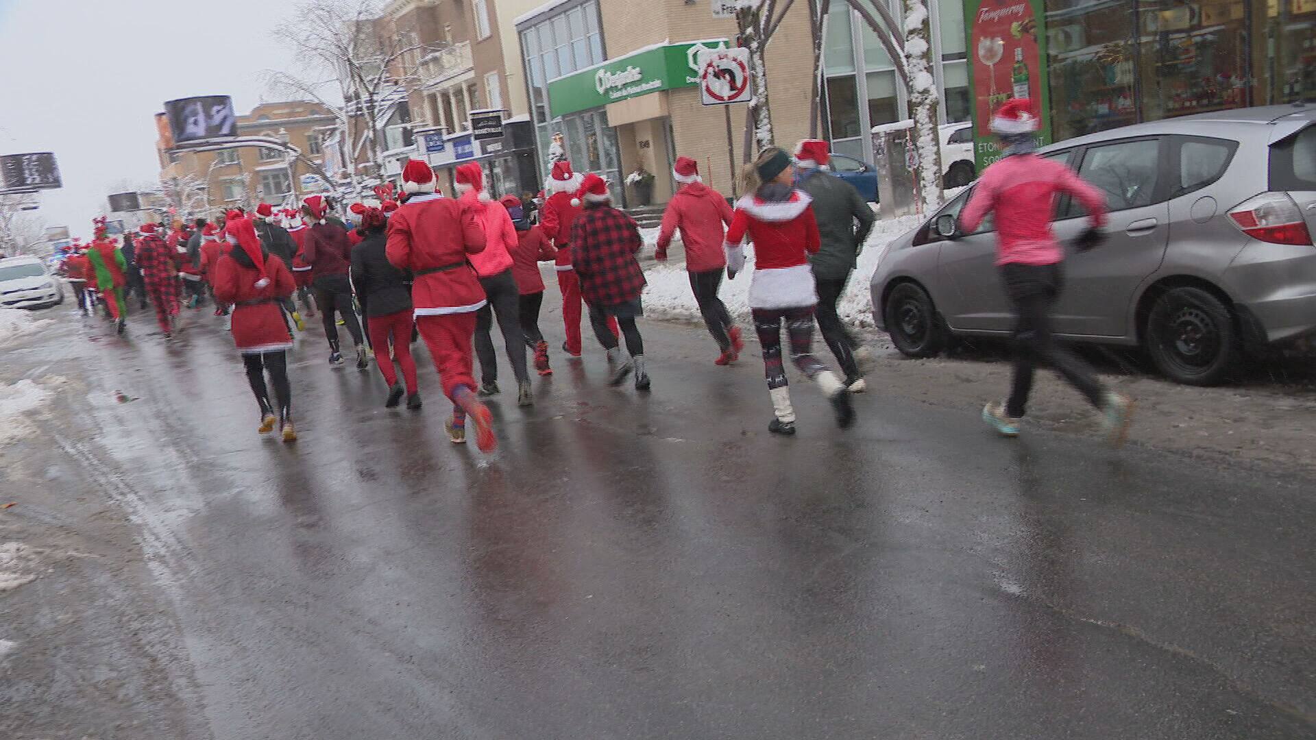 Une centaine de pères Noël courent pour la bonne cause à Québec | JDQ