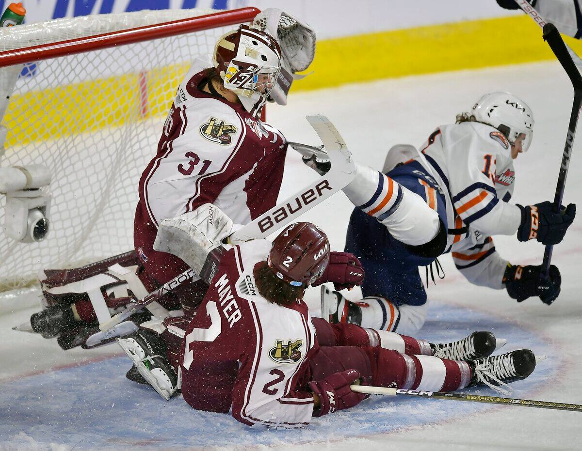 Escorté sur une civière dimanche, le défenseur des Blazers de Kamloops ...