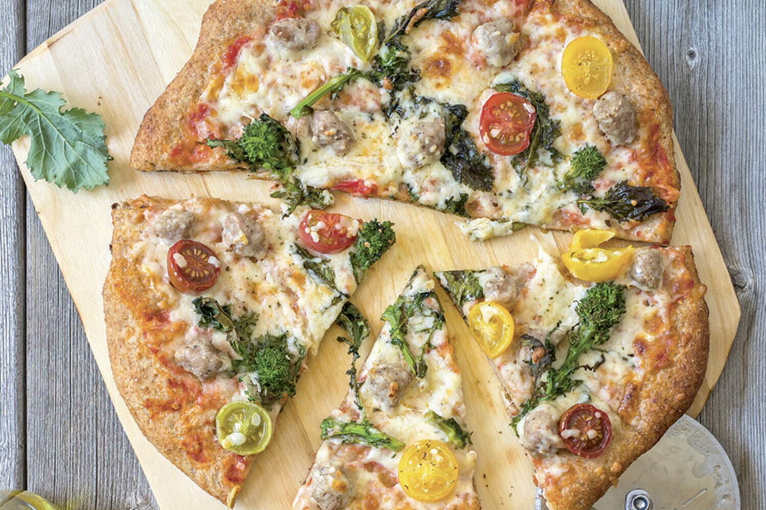 Recette de pizza aux saucisses et aux rapinis | Recettes du Québec