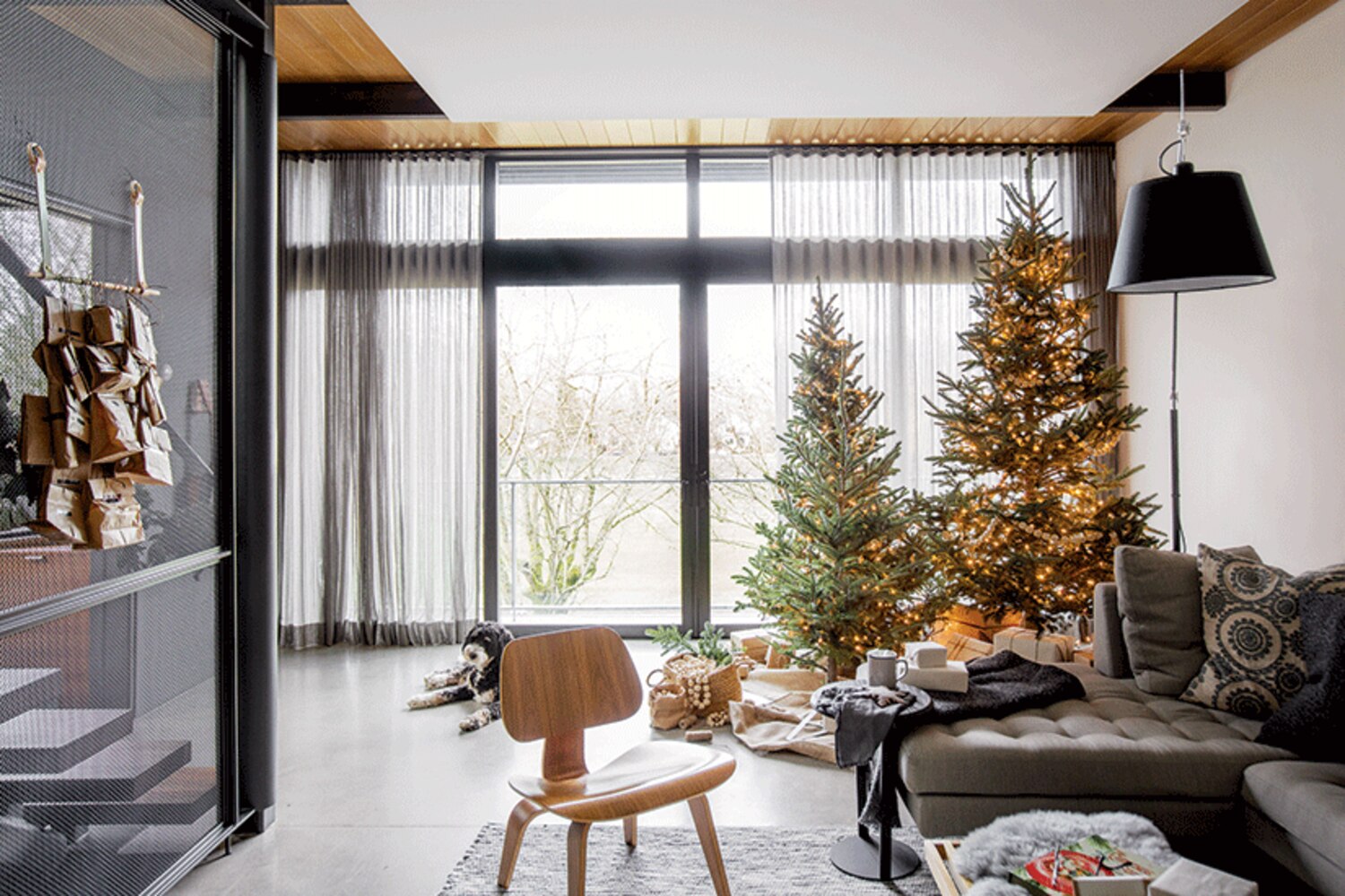 A Scandi-chic home made festive with twinkling lights and lots of ...