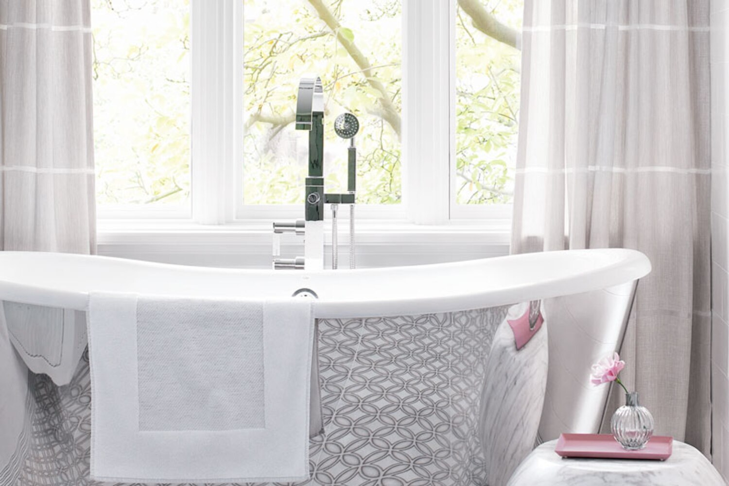 A grey-scale bathroom with essentials that look like works of art ...